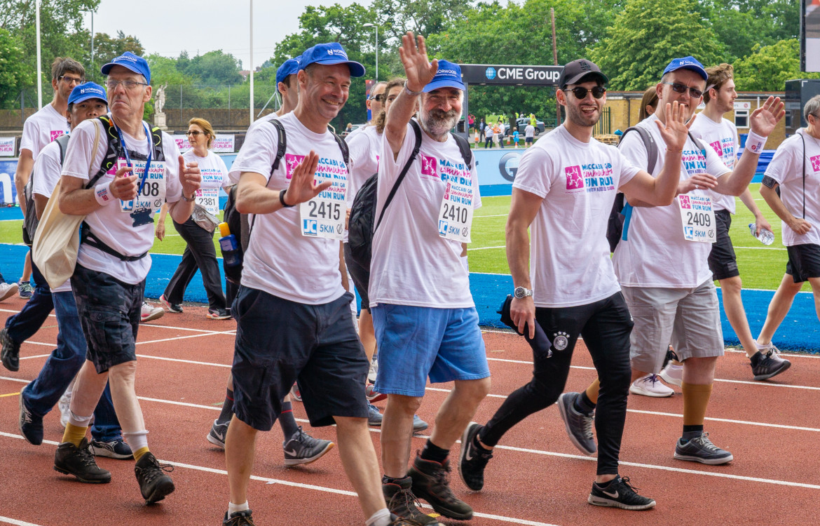 Total Merchandise Provides Hats To Charity Norwood